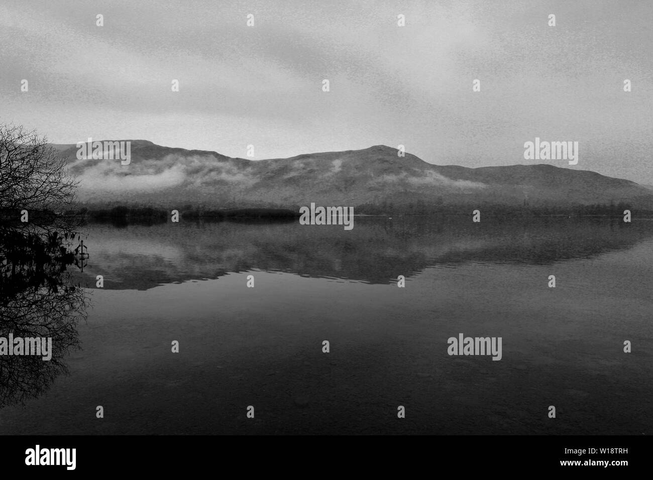Mist over Derwentwater lake, Keswick town, Lake District National Park ...