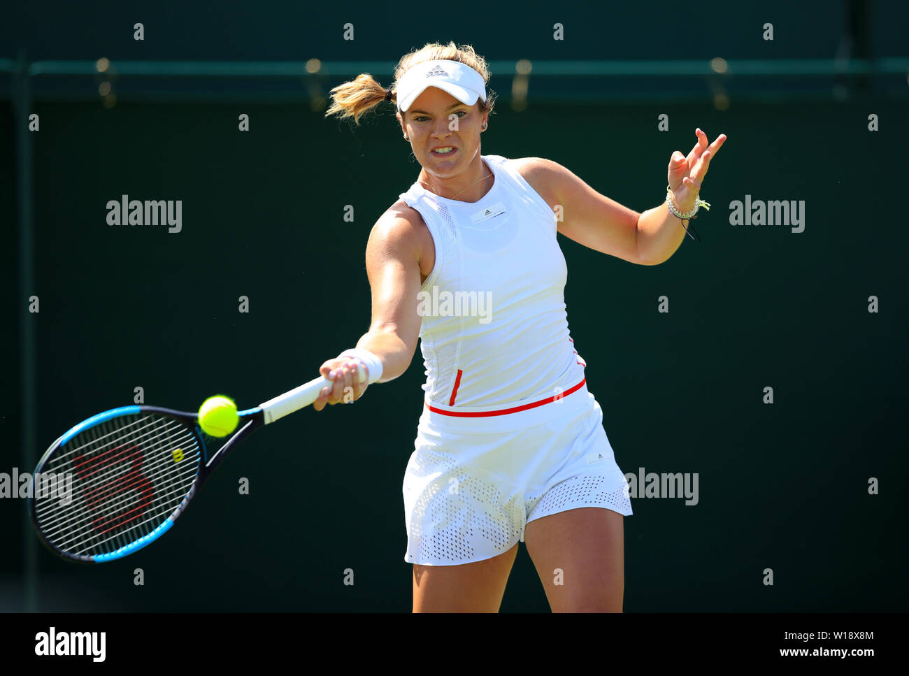 Caty McNally in action on day one of the Wimbledon Championships at the ...