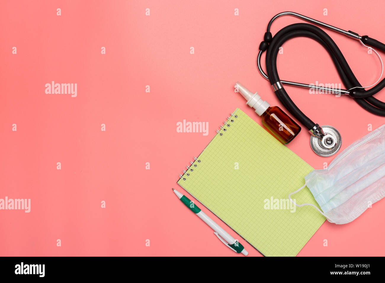 Medical equipment on a pink pastel background Stock Photo - Alamy