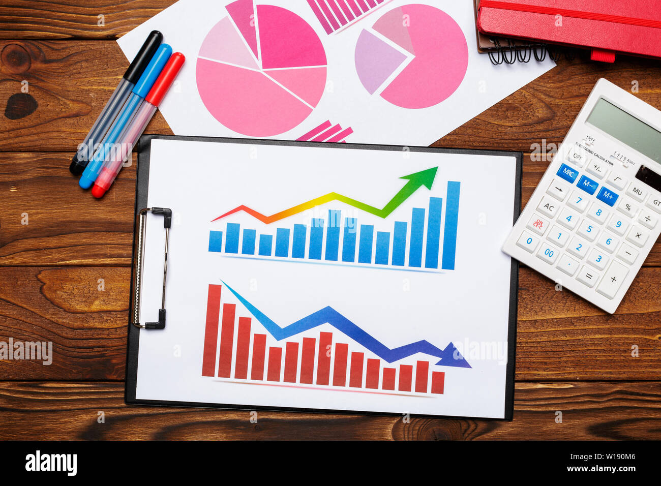 Top view of business paper chart or graph on wooden table Stock Photo ...