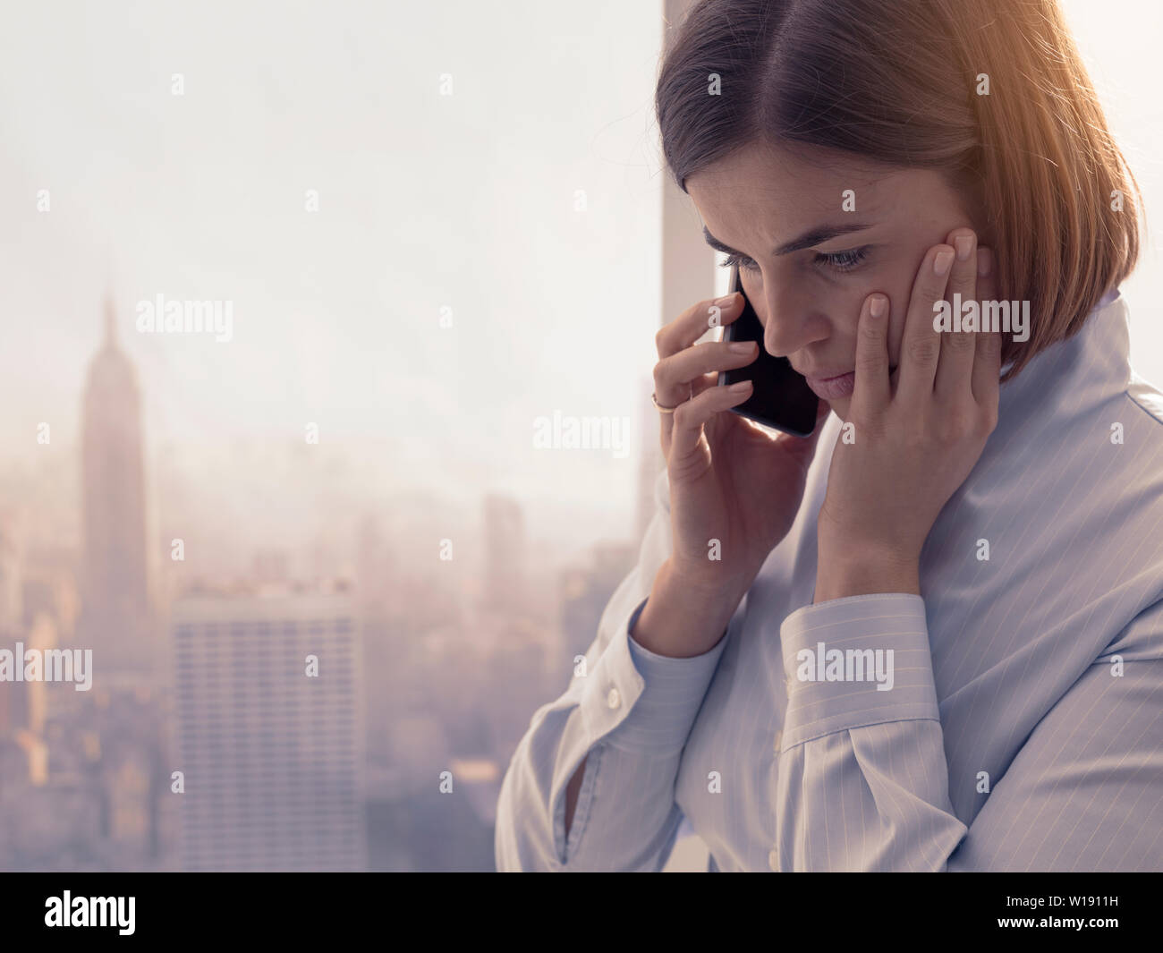 Woman receiving bad news hi-res stock photography and images - Alamy