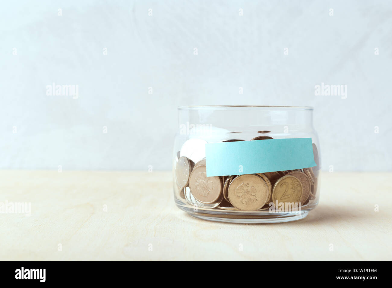 Coins in Glass Bottles, Savings Money Ideas Stock Photo - Alamy
