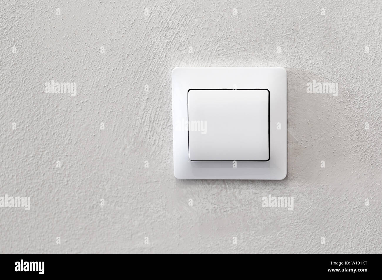 light switch built into the texture wall Stock Photo - Alamy