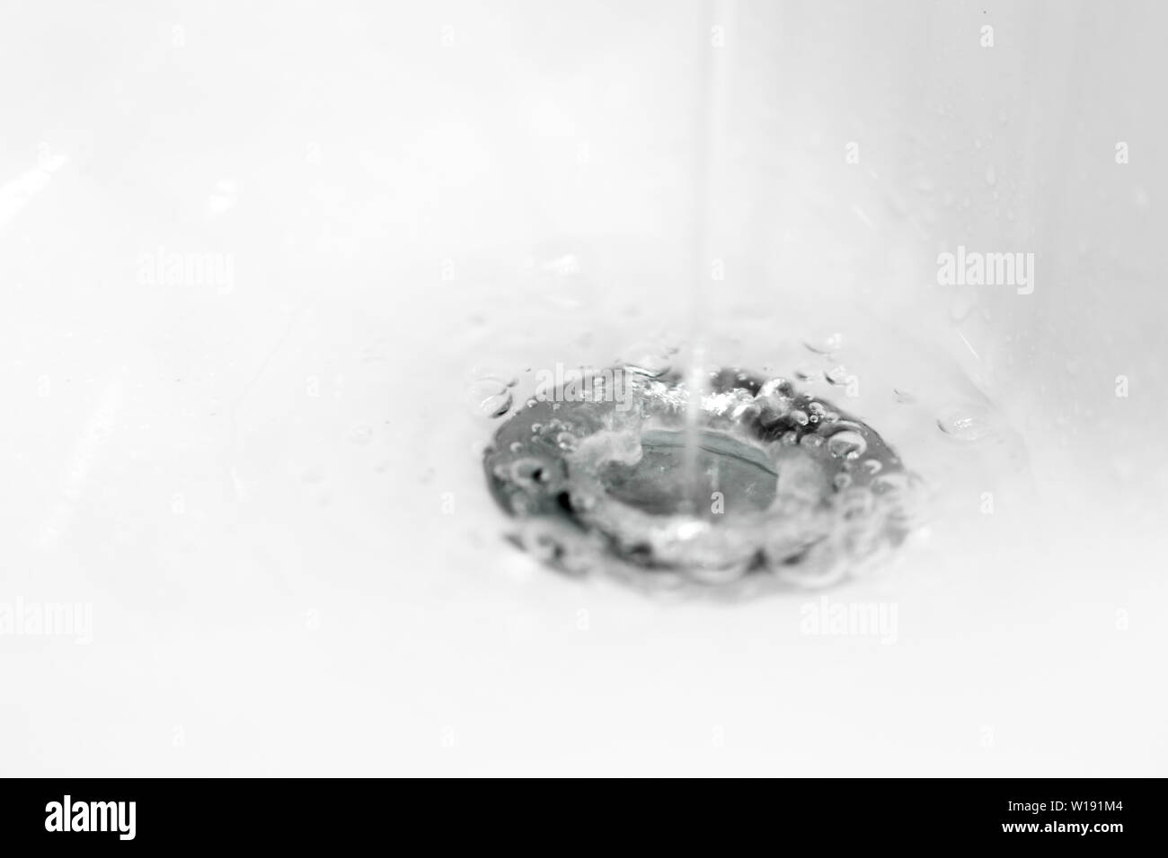 Water in sink Stock Photo - Alamy