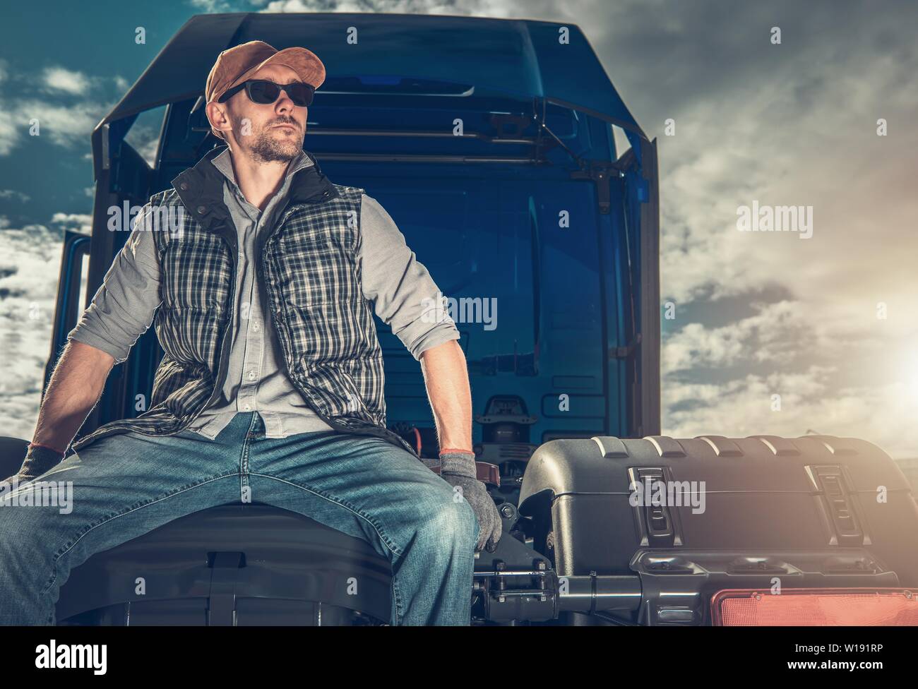 Caucasian Semi Truck Driver Seating on a Tractor and Waiting For ...
