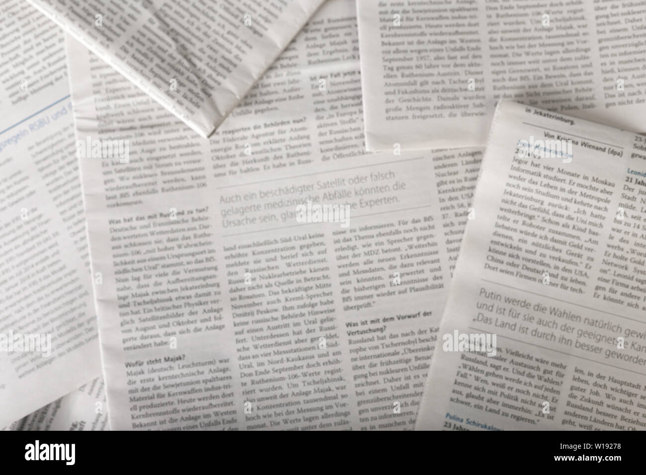 newspaper background, top view Stock Photo - Alamy