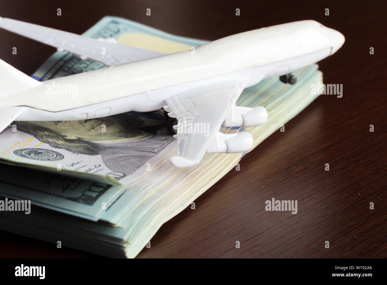 airplane on the money Stock Photo - Alamy