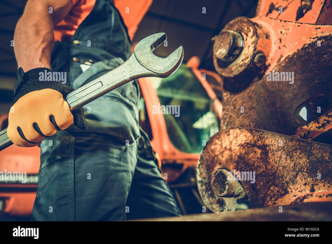 Powerful Professional Mechanic. Heavy Duty Equipment Maintenance ...