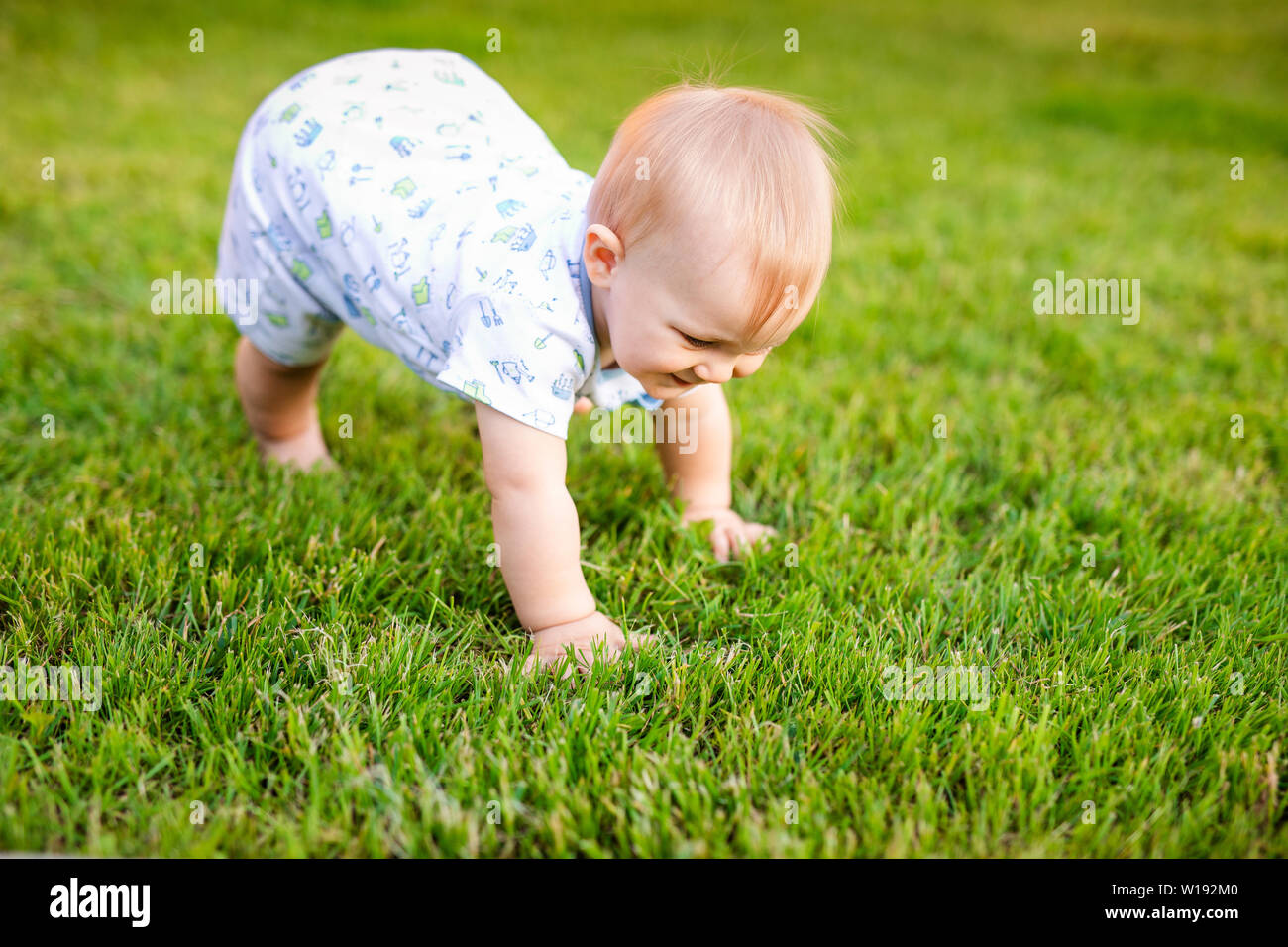 Girl crawling field hi-res stock photography and images - Alamy
