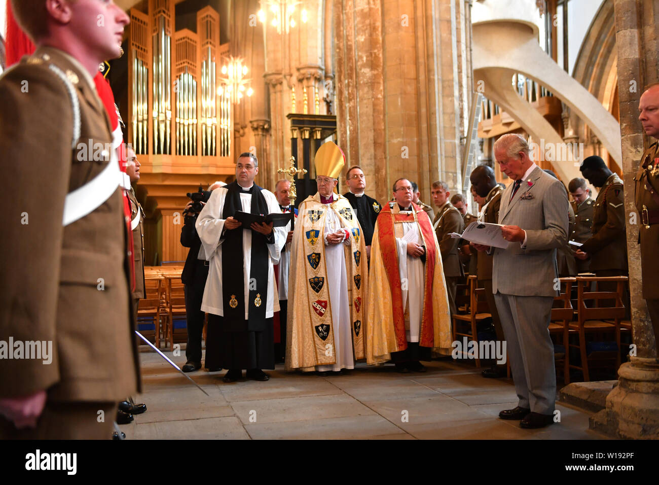 The Prince of Wales (right) during a memorial service in Cardiff to ...