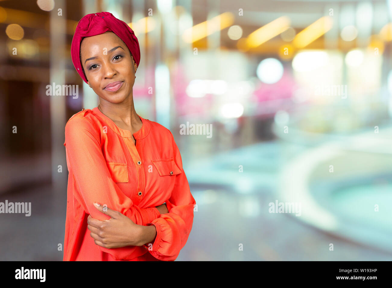 Young Afro beauty wearing a red headscarf Stock Photo - Alamy