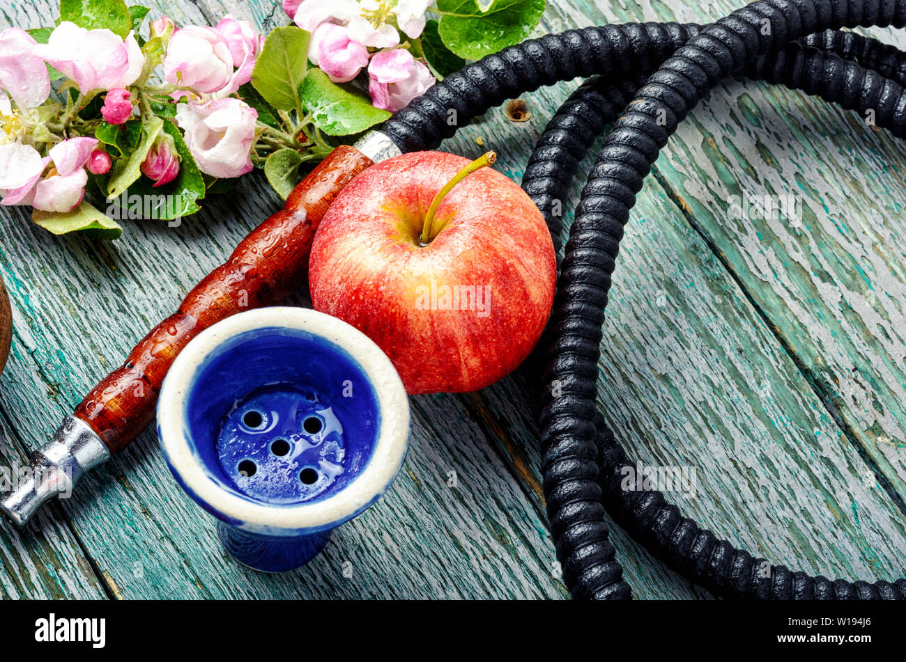 Modern fruit hookah.Eastern shisha with apple.Hookah and apple Stock ...