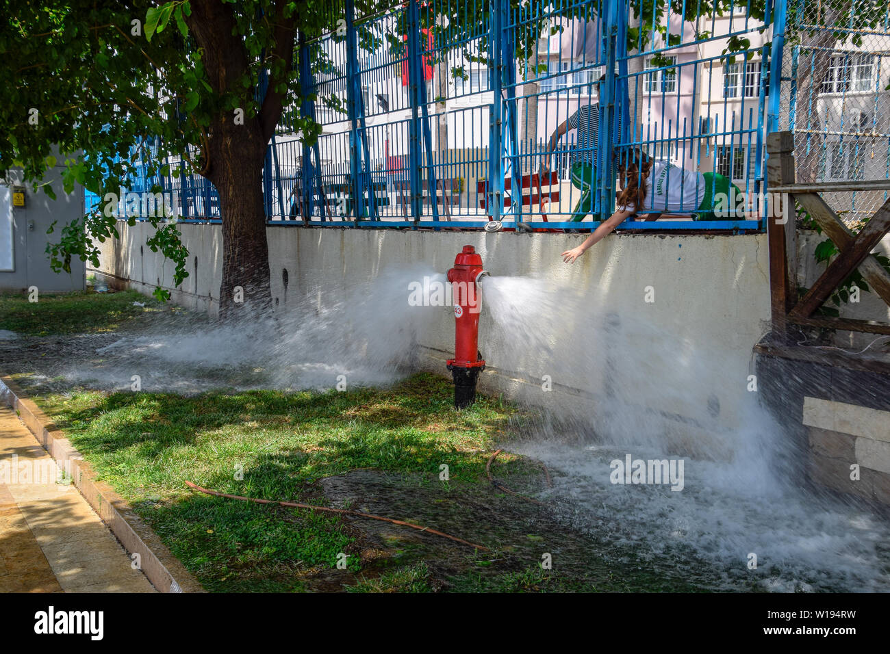 Antalya, Turkey - May 20, 2019: Open fire hydrant, water flows from a ...