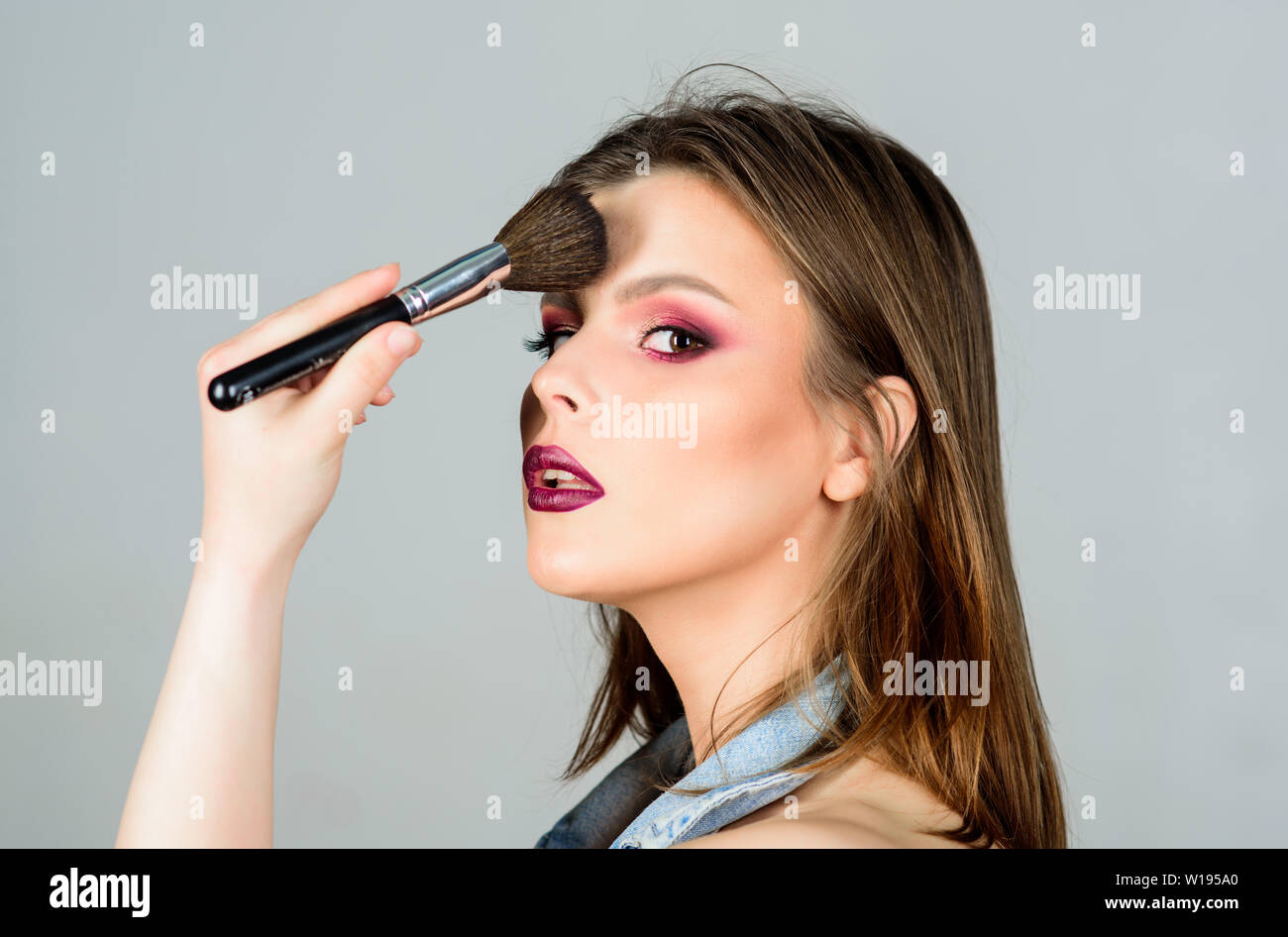 Emphasize femininity. Professional makeup supplies. Different brushes ...