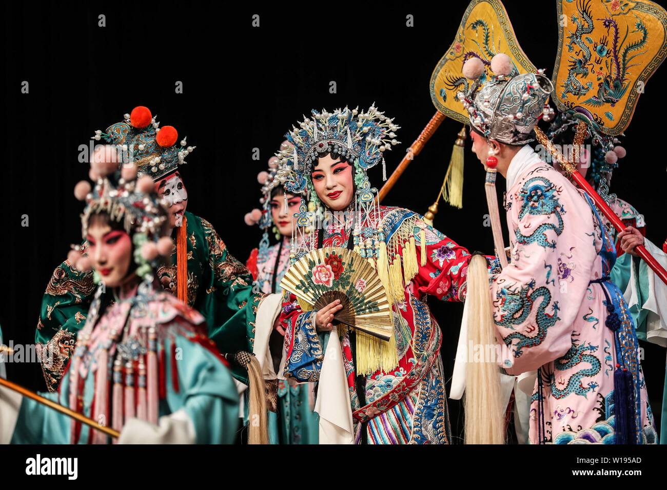Dalian, China's Liaoning Province. 1st July, 2019. Artists perform ...