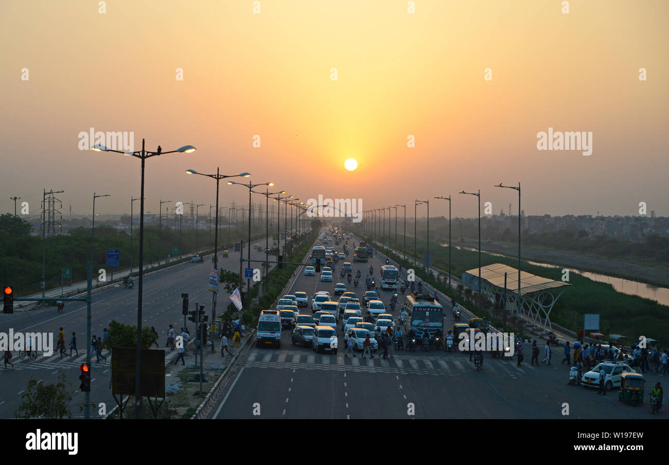 sunset with traffic on Highway at New Delhi,India Stock Photo - Alamy