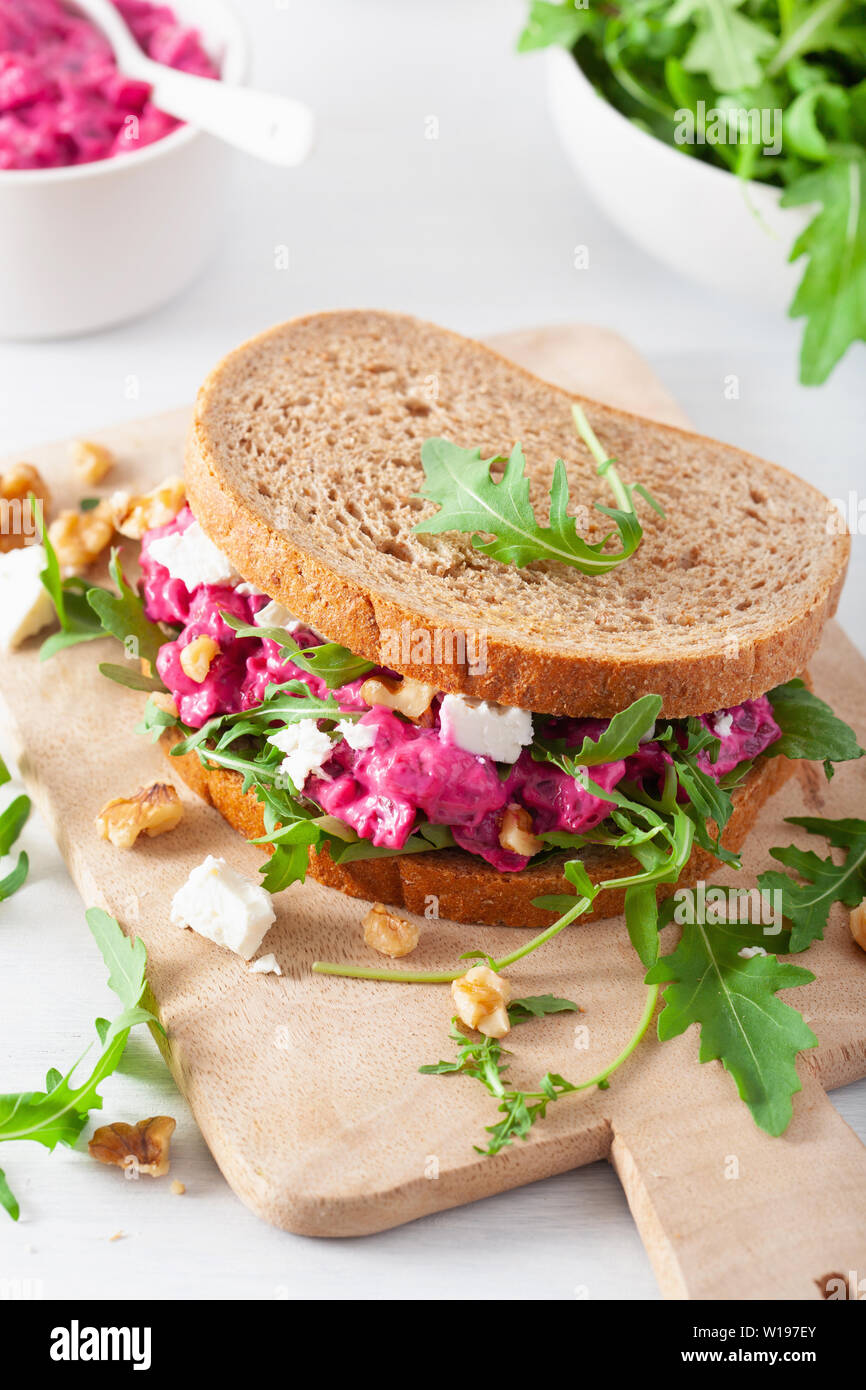 beetroot and feta cheese sandwich with walnuts and rocket Stock Photo ...