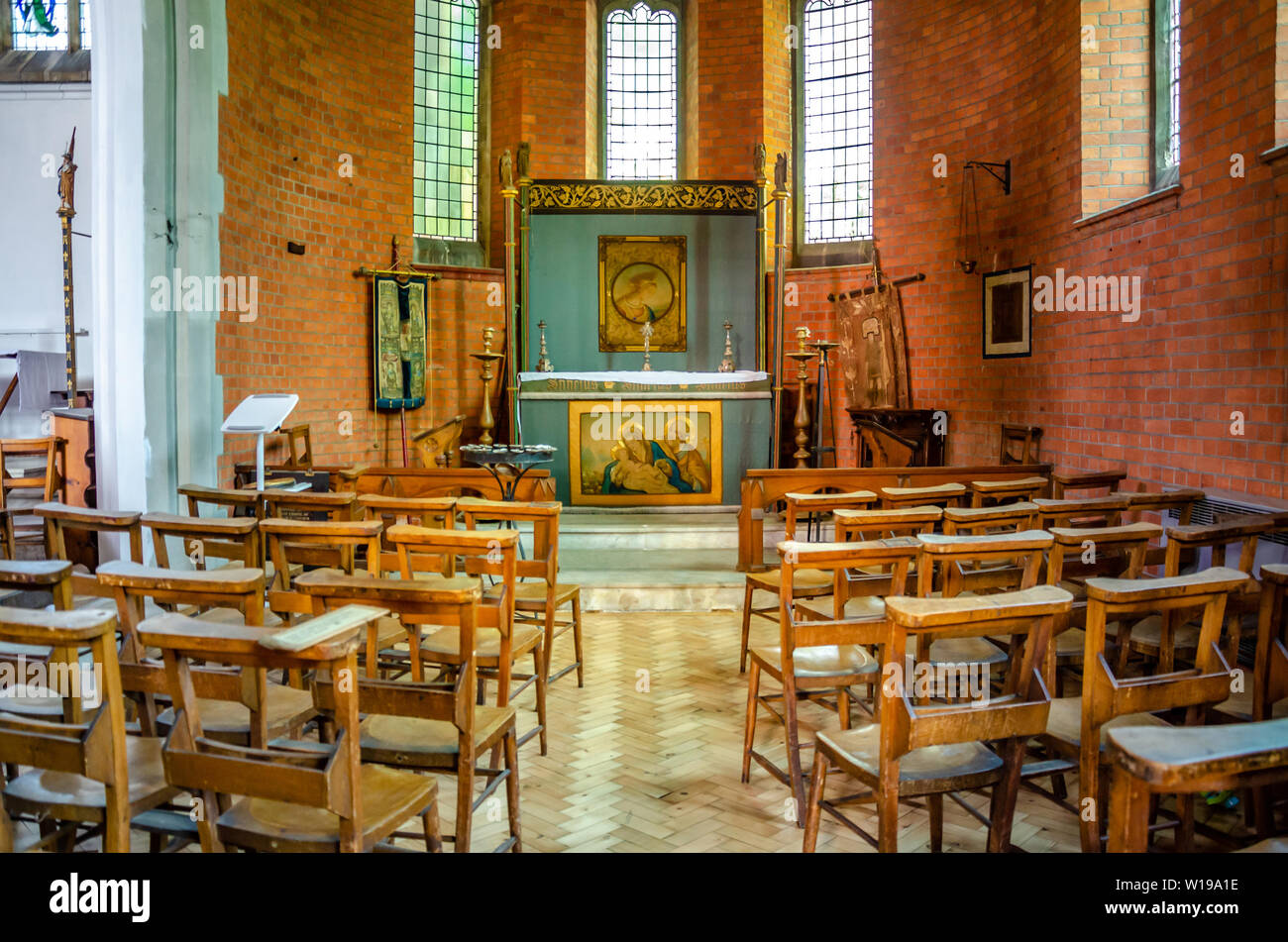 Rows of chairs in a chapel on the side of a church Stock Photo - Alamy