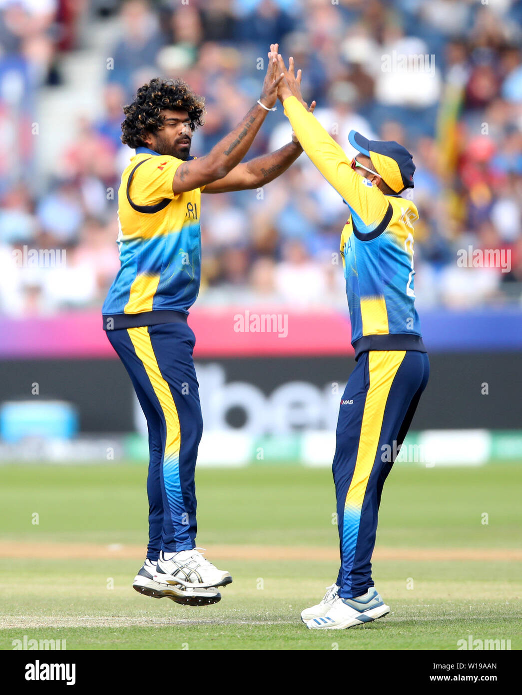Sri Lanka's Lasith Malinga (left) celebrates taking the wicket of West ...