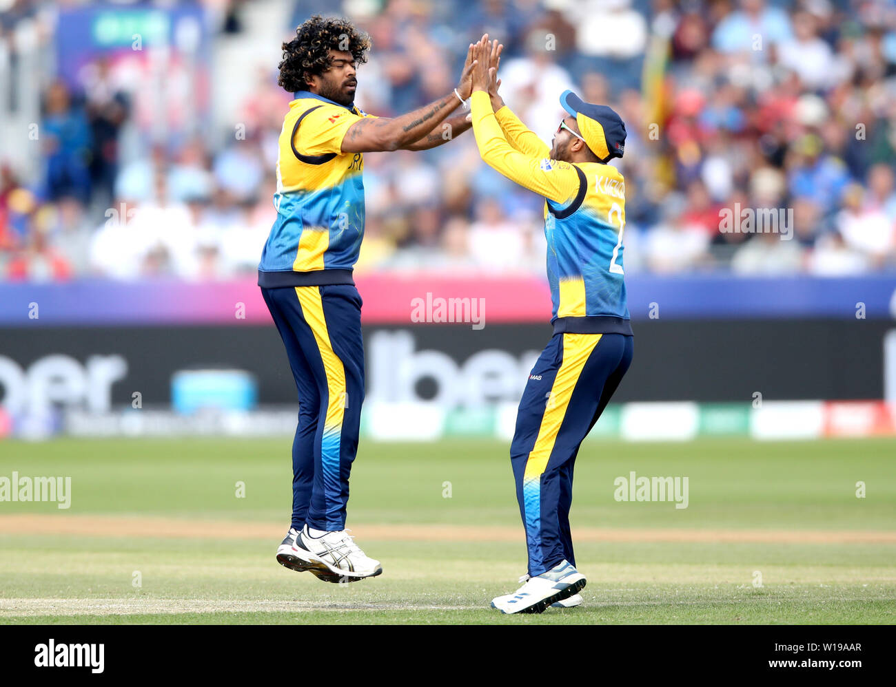 Sri Lanka's Lasith Malinga (left) celebrates taking the wicket of West ...