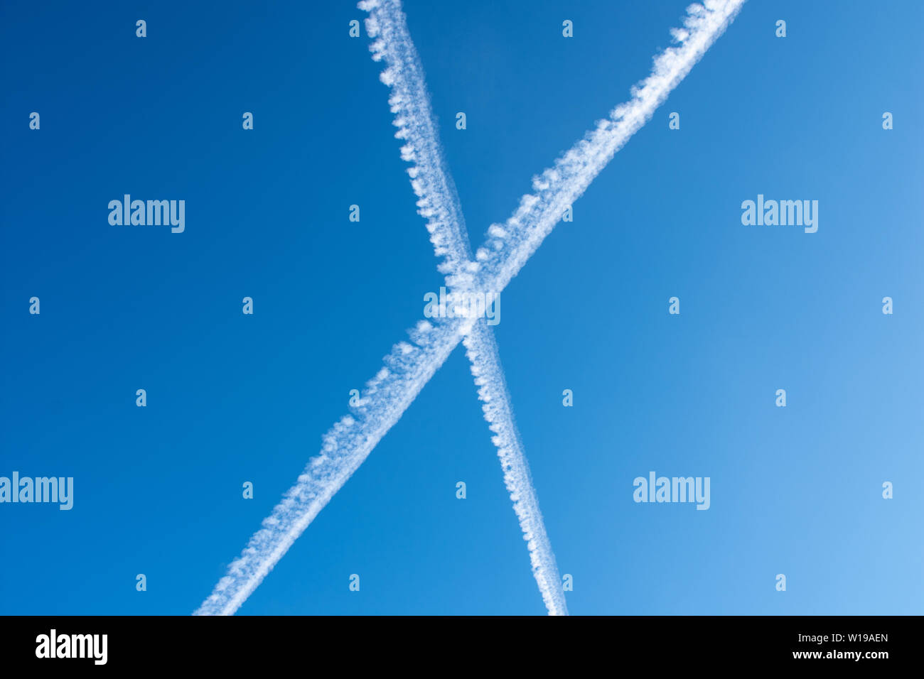 Plane jet trails hi-res stock photography and images - Alamy