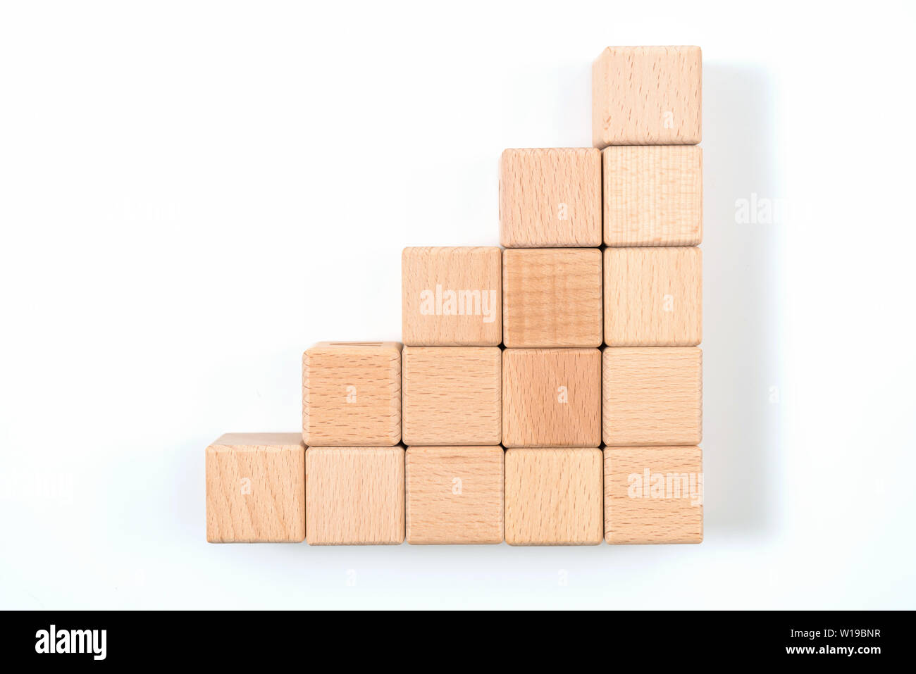 wood cube arrange in pyramid shape ,business concept Stock Photo - Alamy