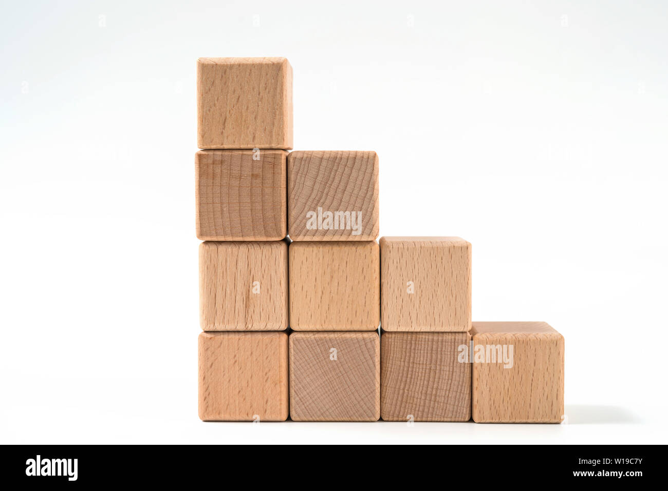 wood cube arrange in pyramid shape ,business concept Stock Photo - Alamy