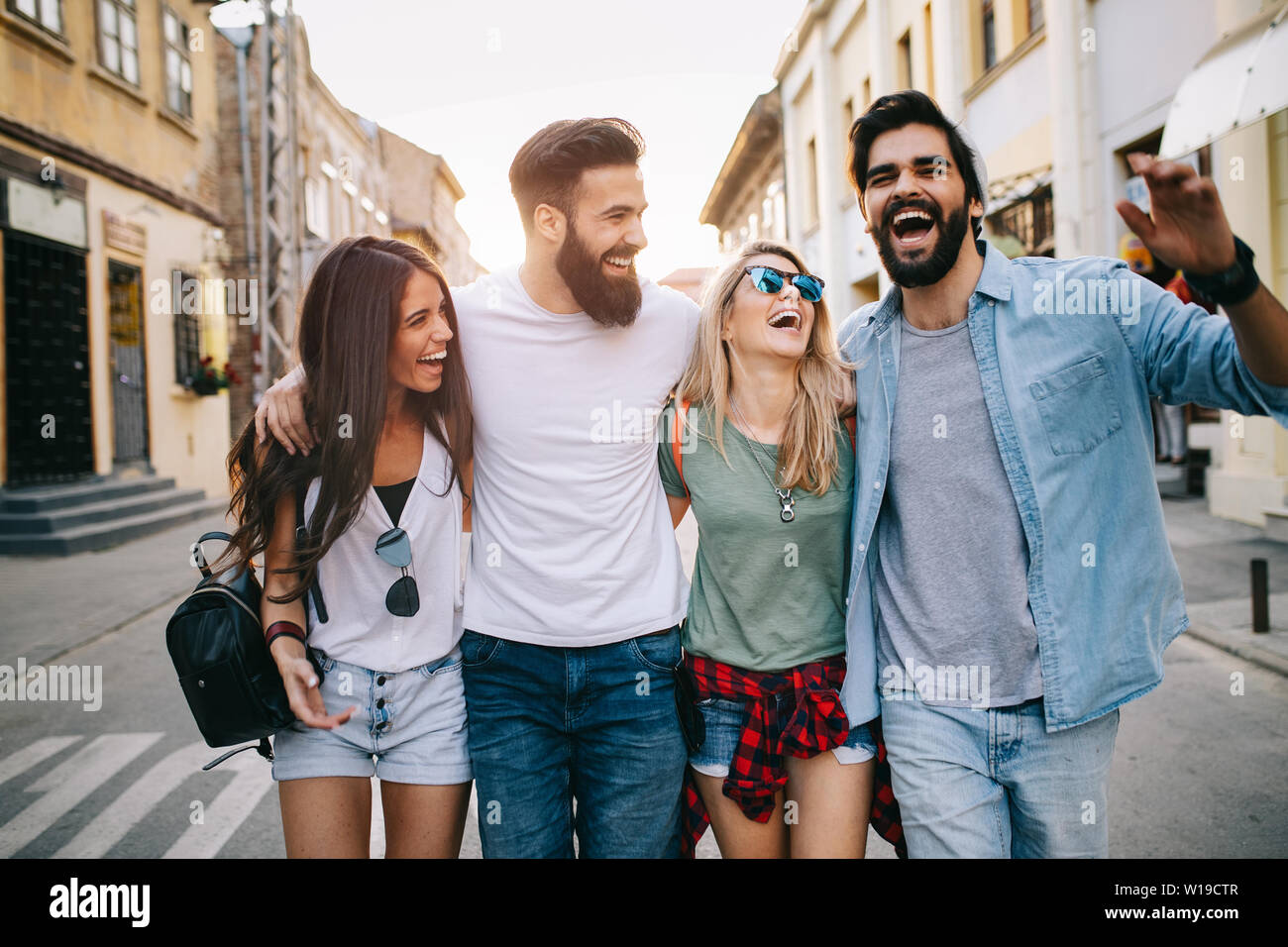 Group of friends hanging out, having fun and enjoying summer days Stock ...