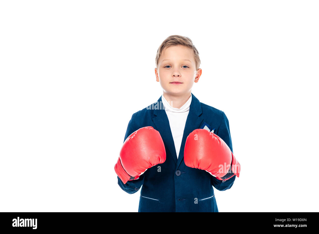 schoolboy in boxing gloves looking at camera Isolated On White with ...