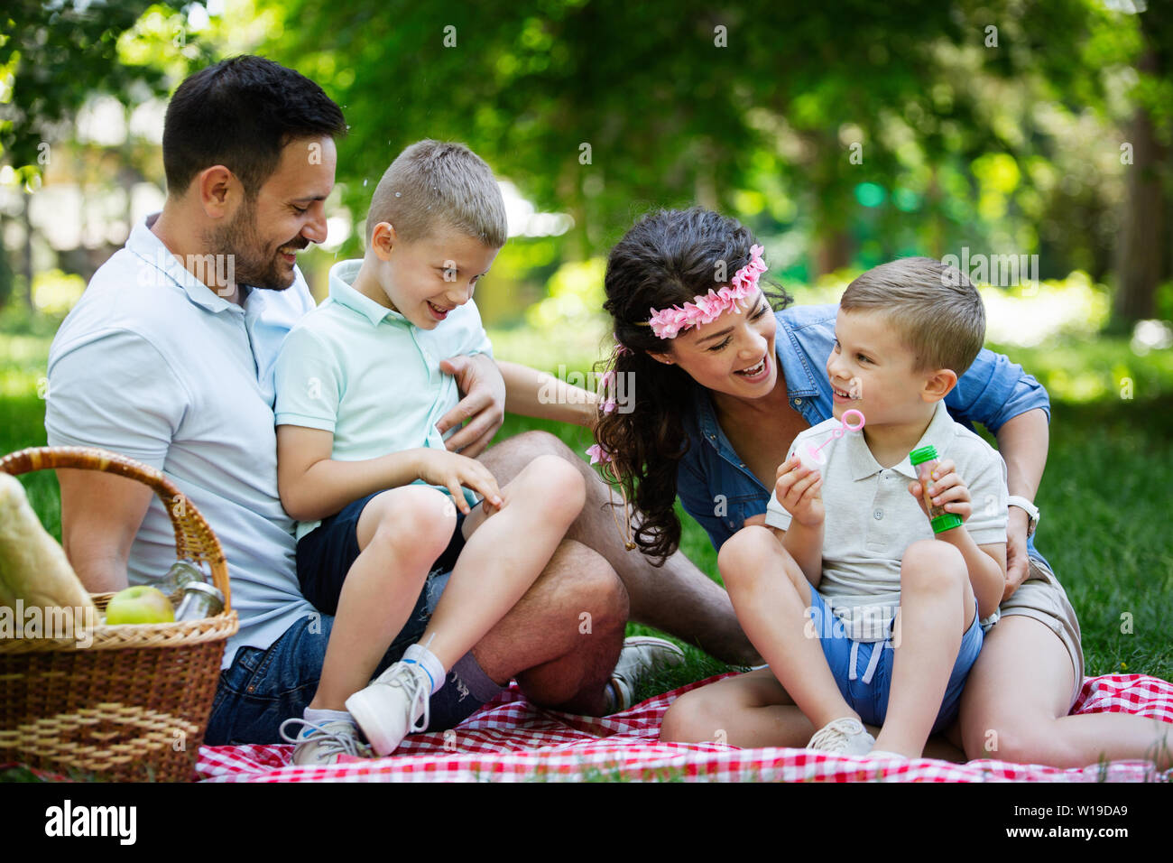 Family with children enjoying a summer day together outdoor Stock Photo ...
