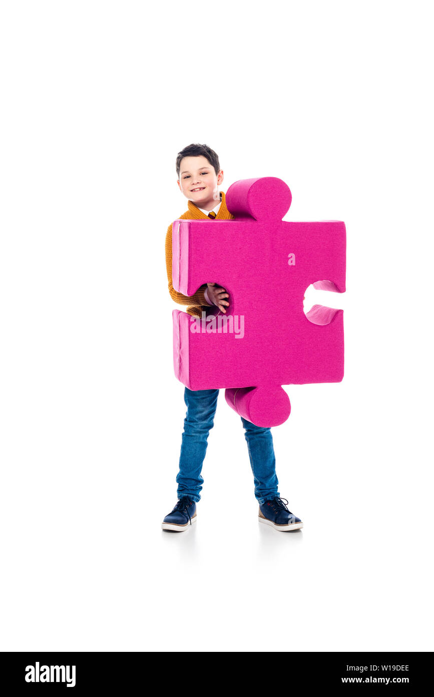 happy boy posing with jigsaw puzzle piece on white Stock Photo - Alamy