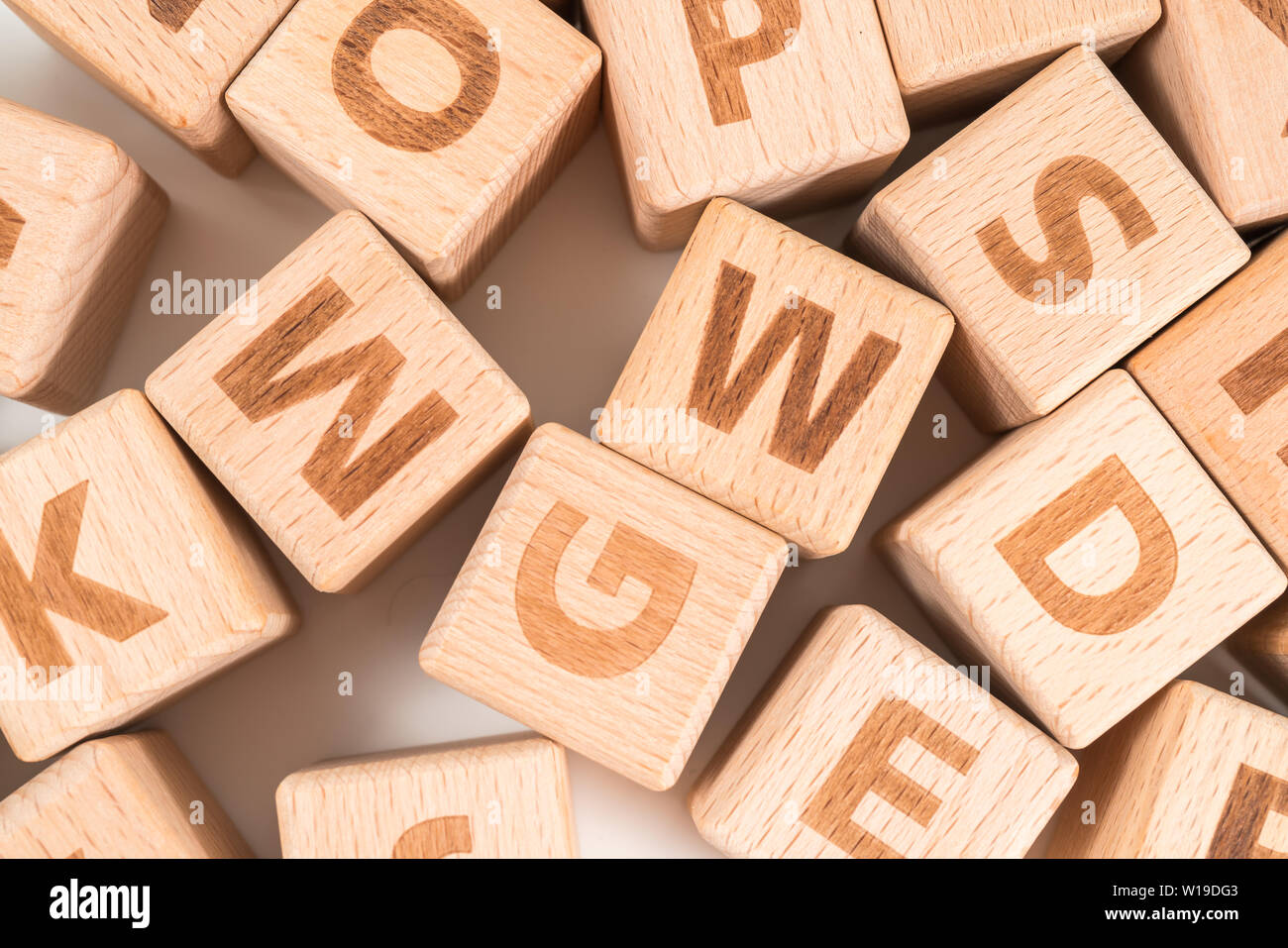 Alphabet on wood ,white background Stock Photo - Alamy