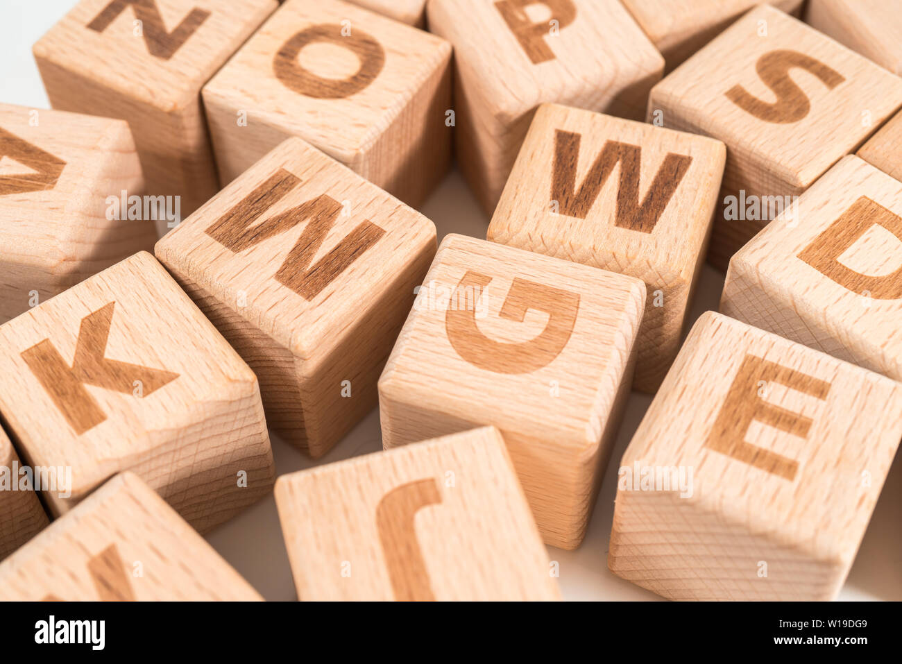 Alphabet on wood ,white background Stock Photo - Alamy