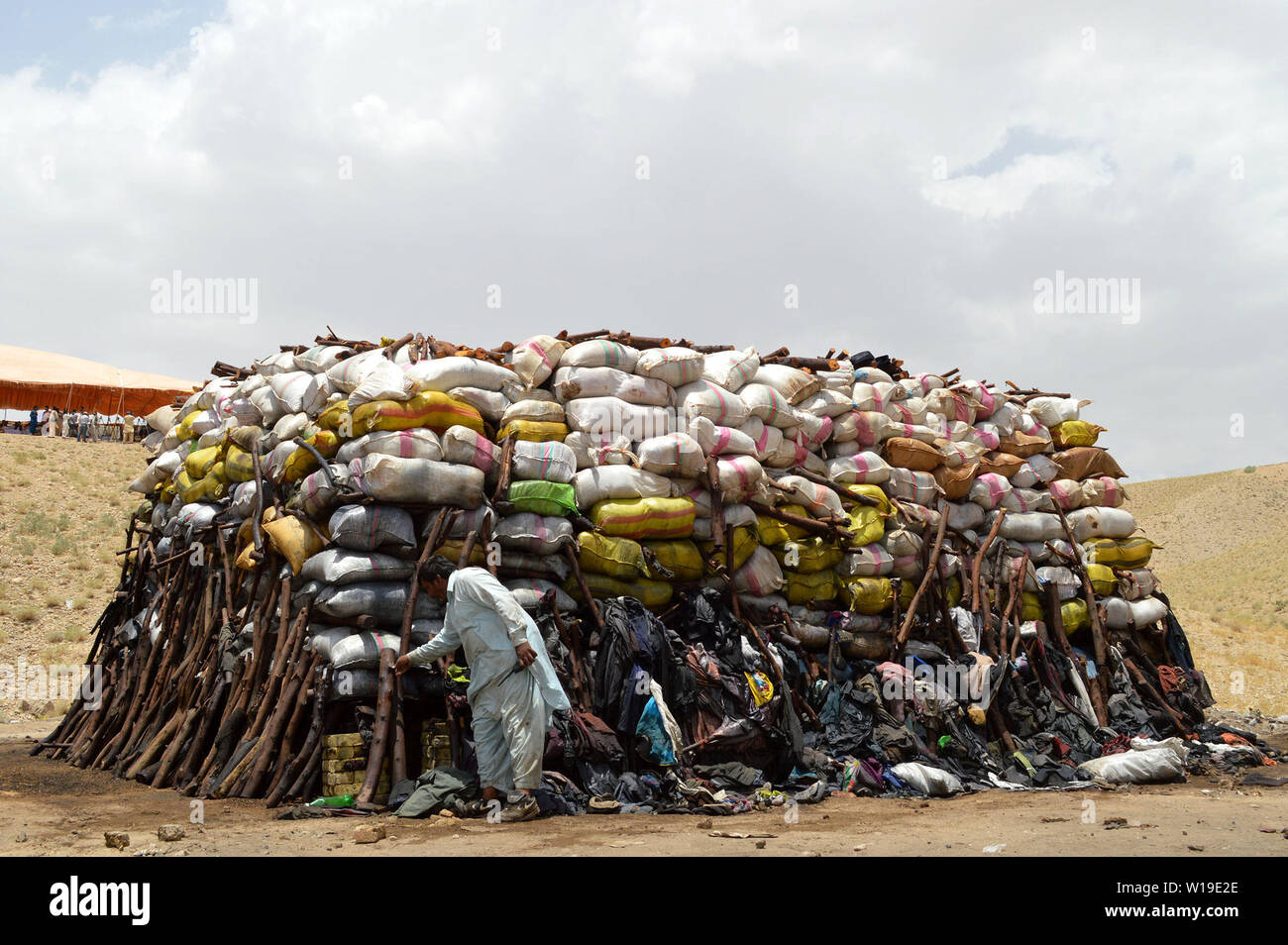 Quetta, Pakistan. 1st July, 2019. A member of Pakistani Anti-Narcotics ...