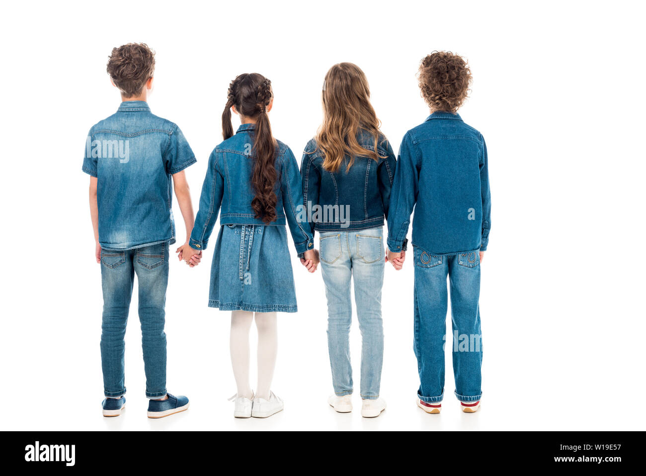 back view of four kids holding hands isolated on white Stock Photo - Alamy