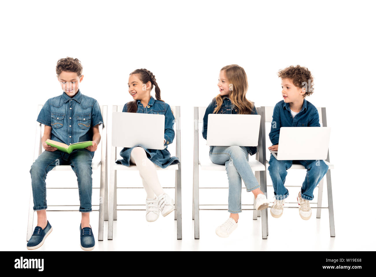 2 or more preteen friends study laptops hi-res stock photography and ...