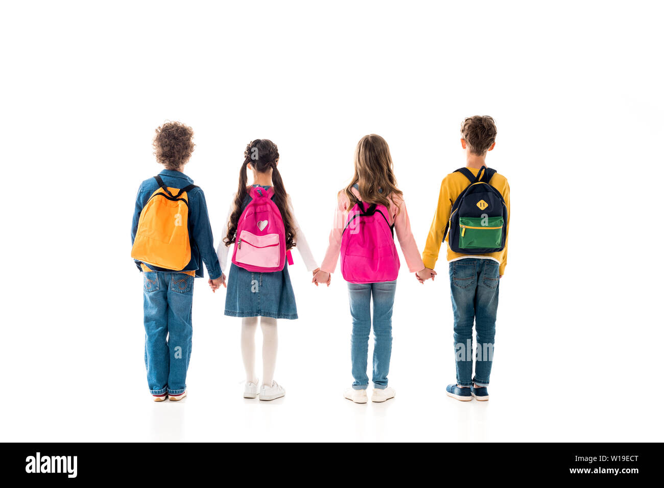 back view of schoolchildren with backpacks holding hands isolated on ...