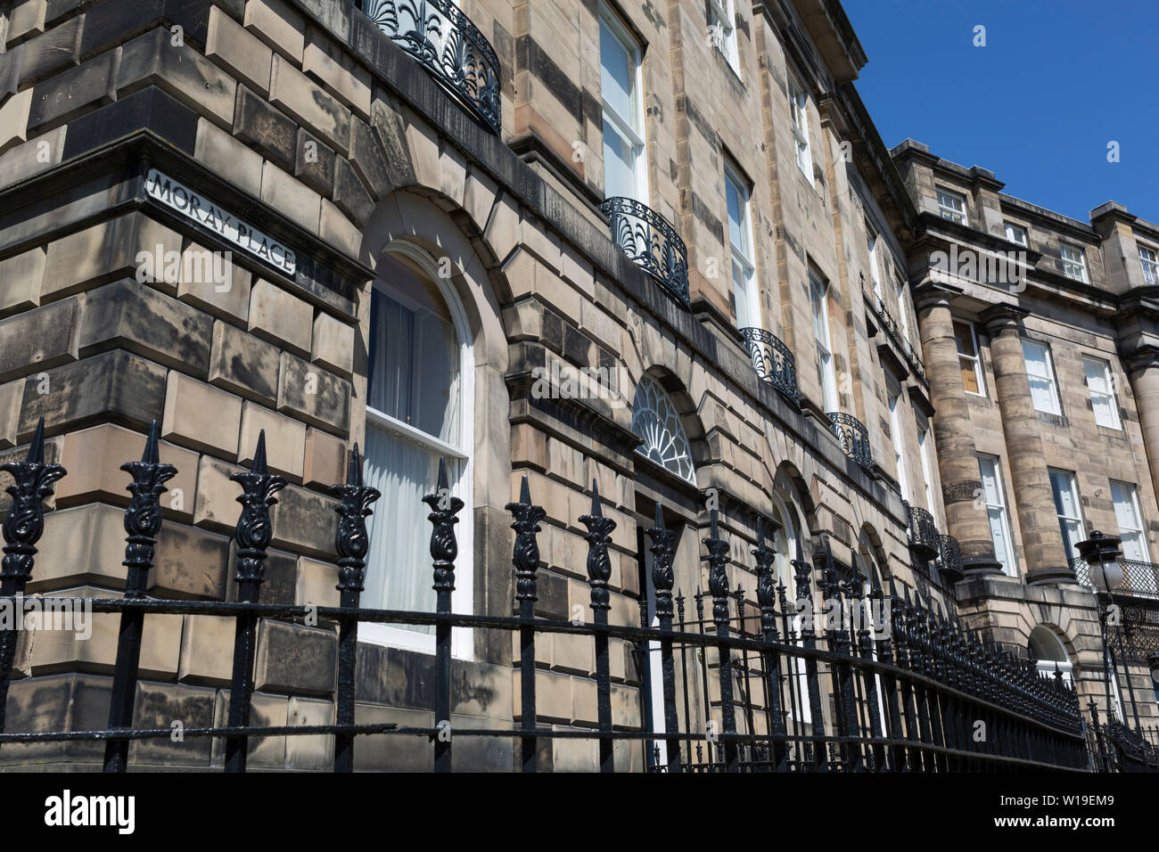 Railing ironwork and housing architecture on Moray Place, in Edinburgh ...