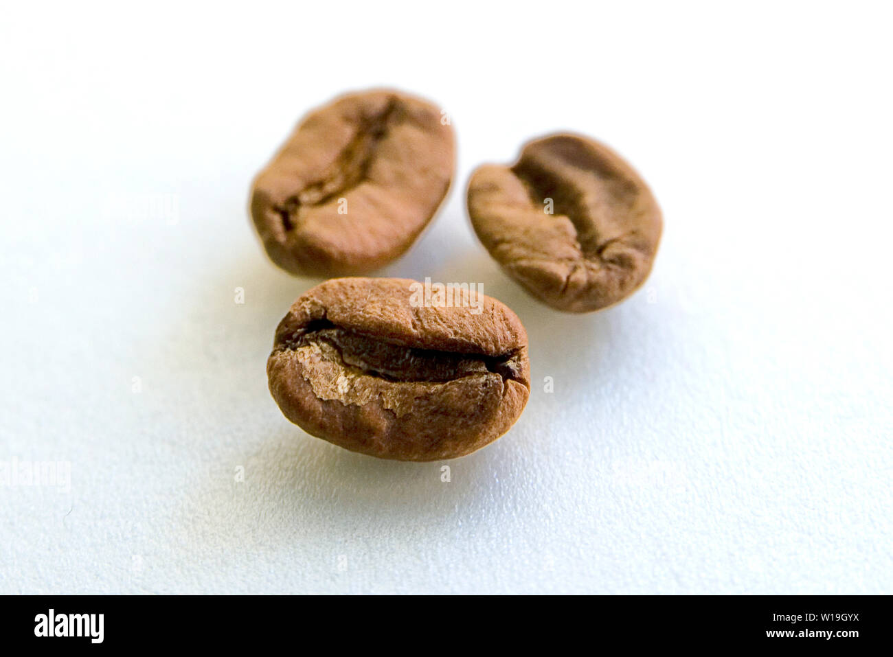 Coffee beans isolated on white Stock Photo - Alamy