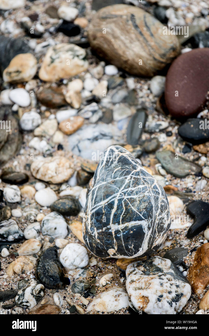 Rounded rocks on the beach hi-res stock photography and images - Alamy