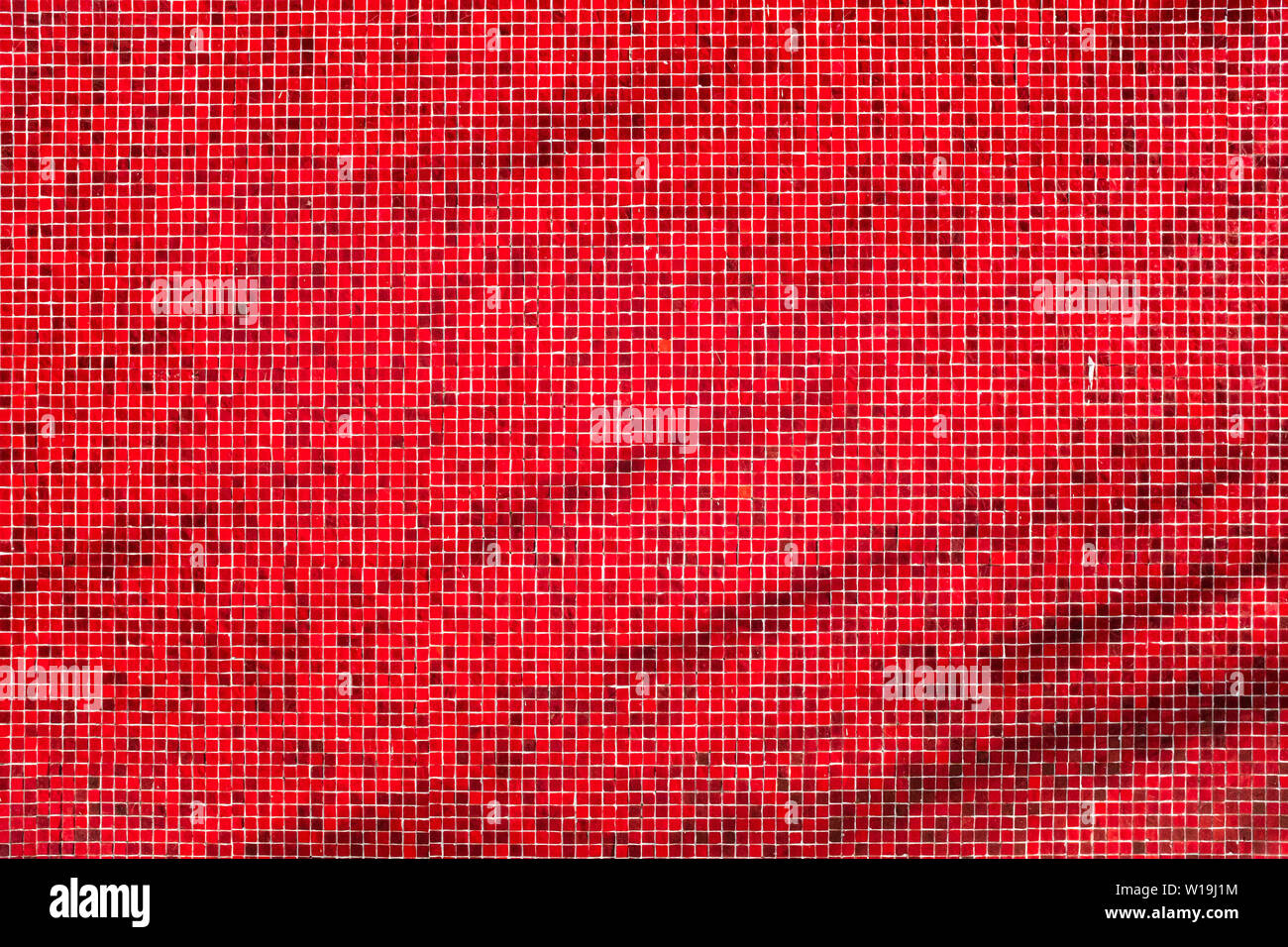 Old red tiled wall with small mosaic squares texture pattern background ...