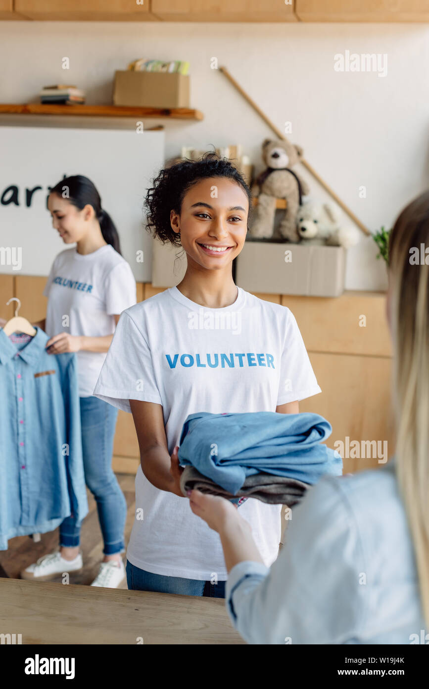 Giving clothes hi-res stock photography and images - Alamy