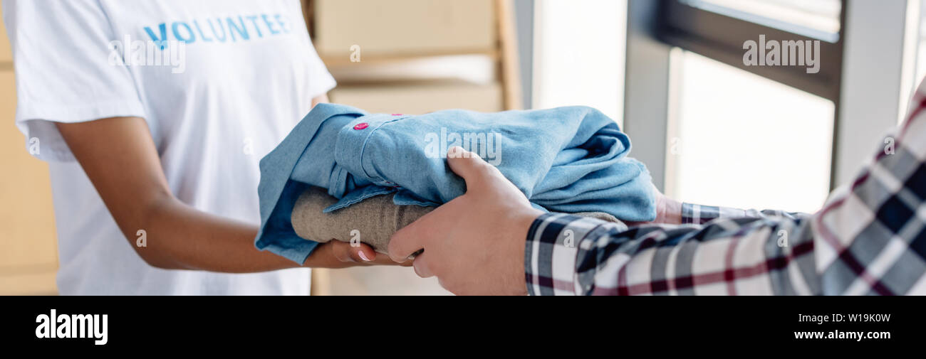 Giving clothes hi-res stock photography and images - Alamy