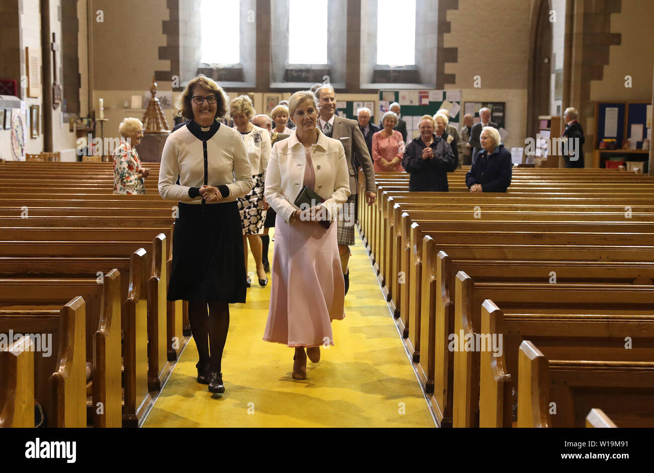 The Earl and Countess of Forfar alongside Rev Elaine Garman inside the ...