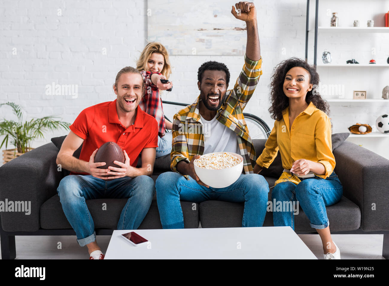 Watching rugby on tv hi-res stock photography and images - Alamy