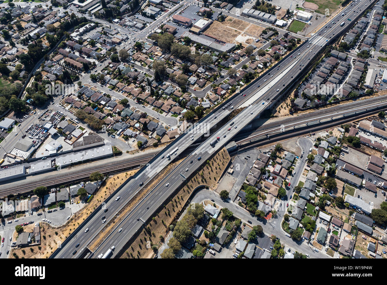 Aerial view of streets, buildings and traffic along the 238 freeway ...