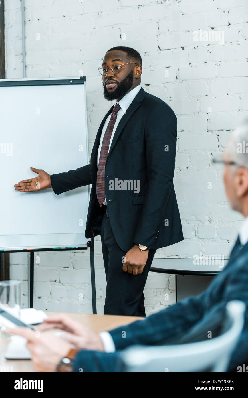 Two handsome men speaking near hi-res stock photography and images - Alamy