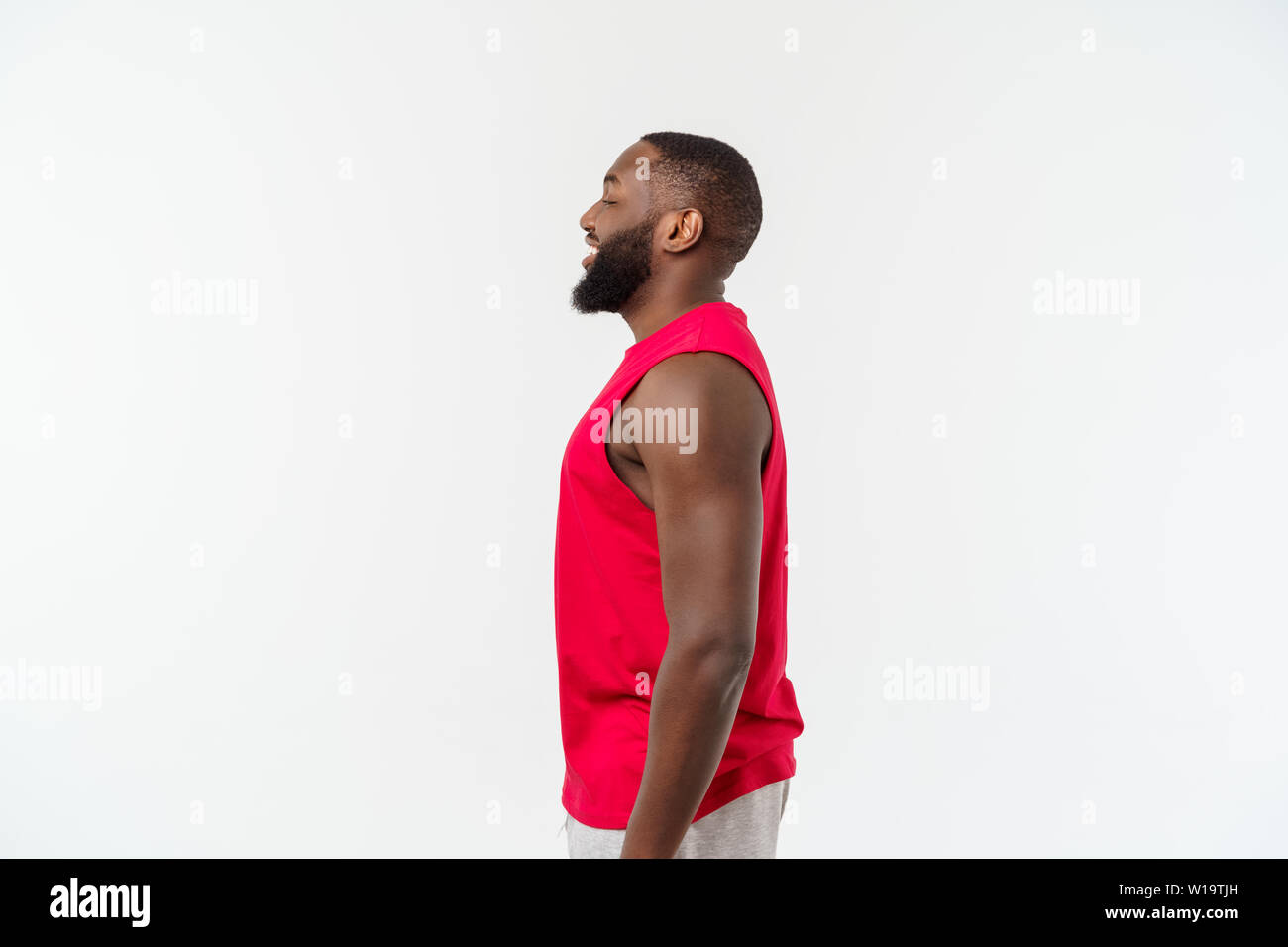 Portrait handsome muscular Black man with cheerful expression Stock ...