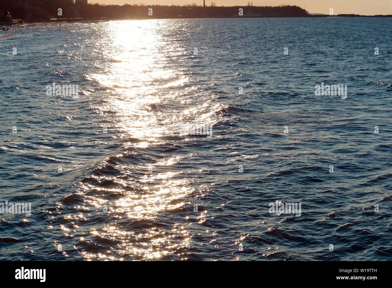 reflection of the sun in the water, sunset on the sea Stock Photo - Alamy