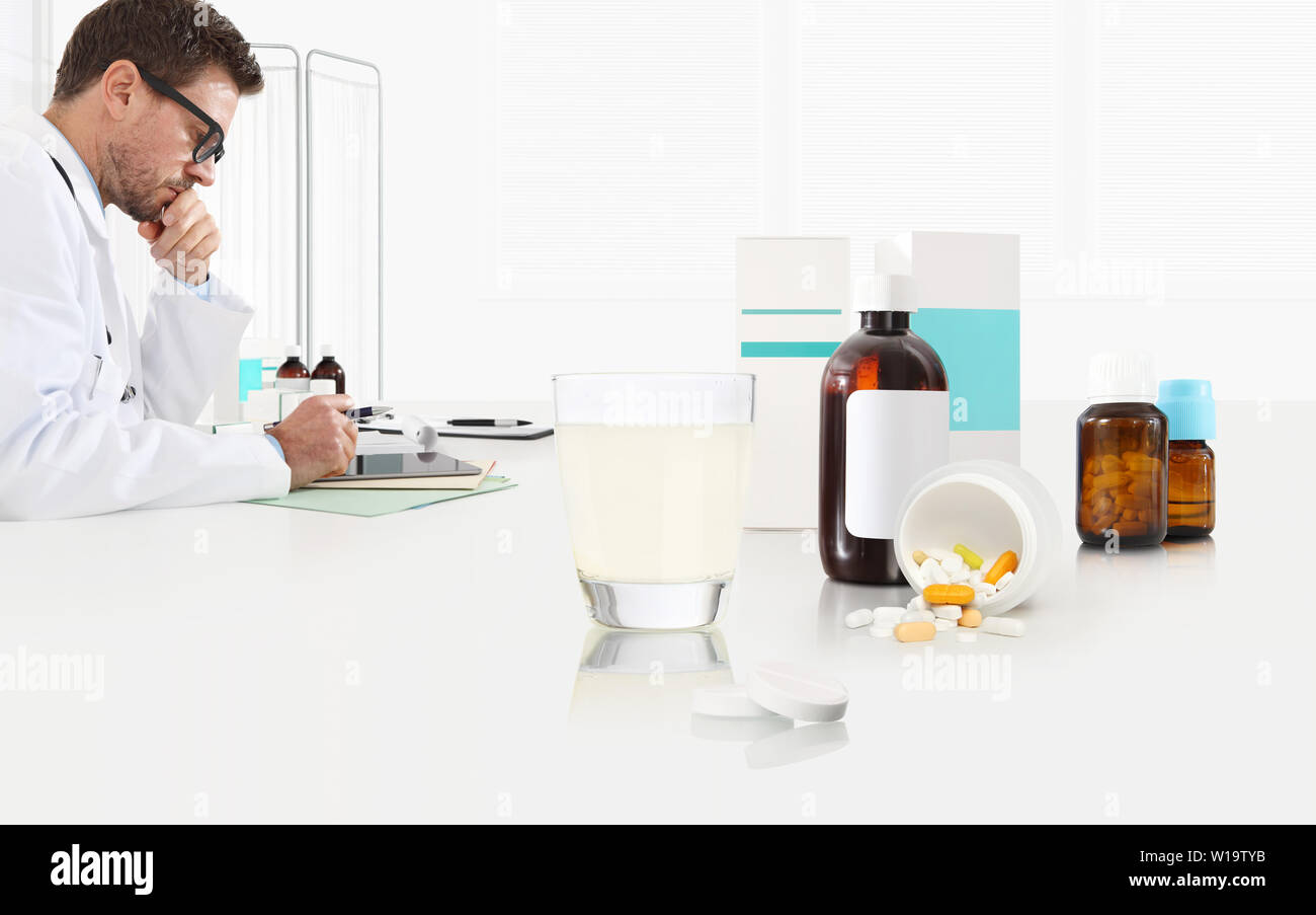 doctor write the medical prescription on a desk office with glass ...